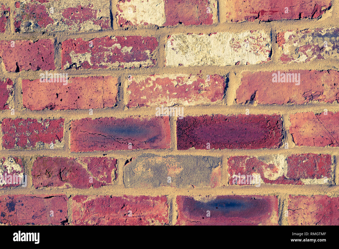 close up of a brick wall that has been build with old bricks, duo toned ...