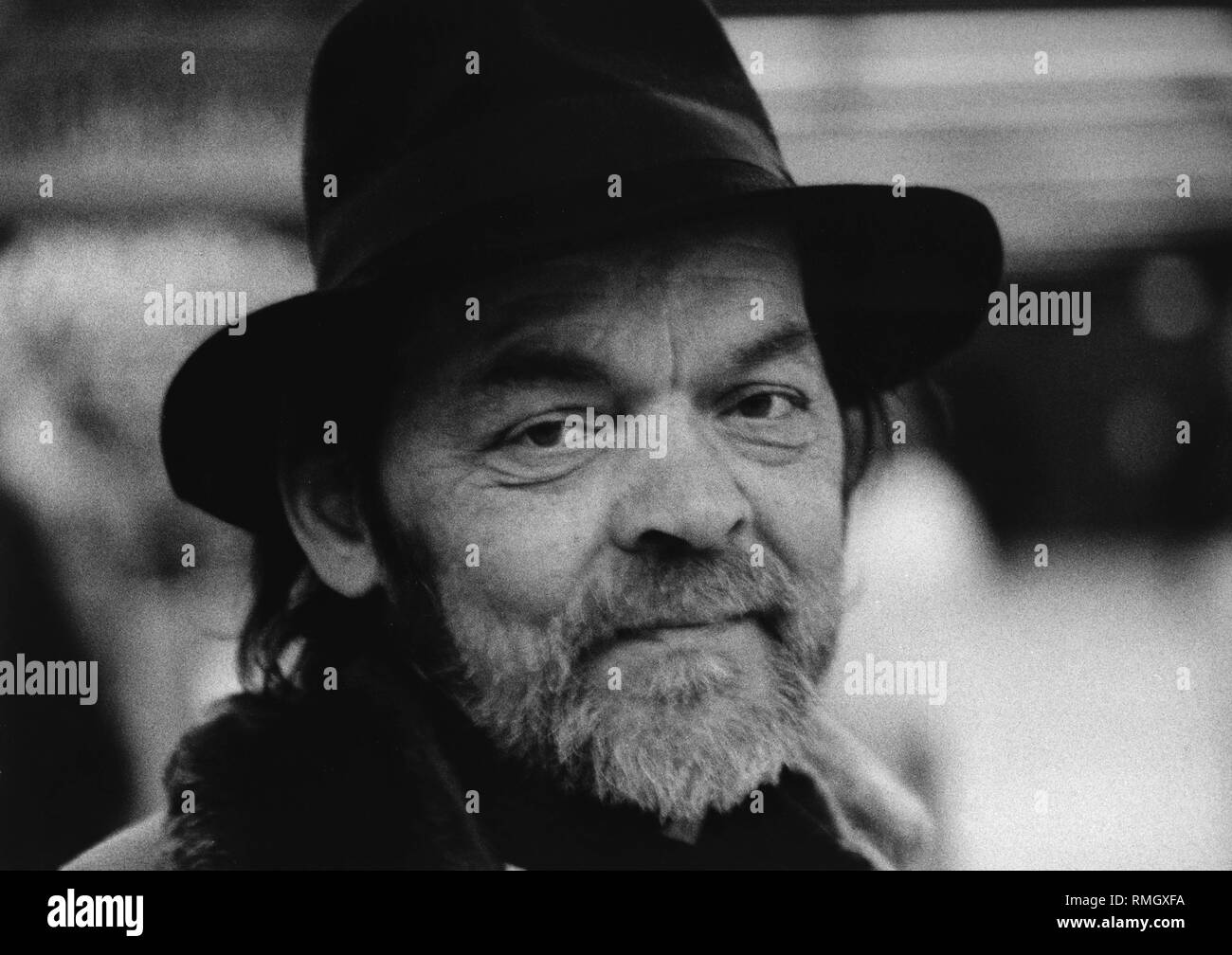 Homeless person with black hat at the subway station Marienplatz in ...