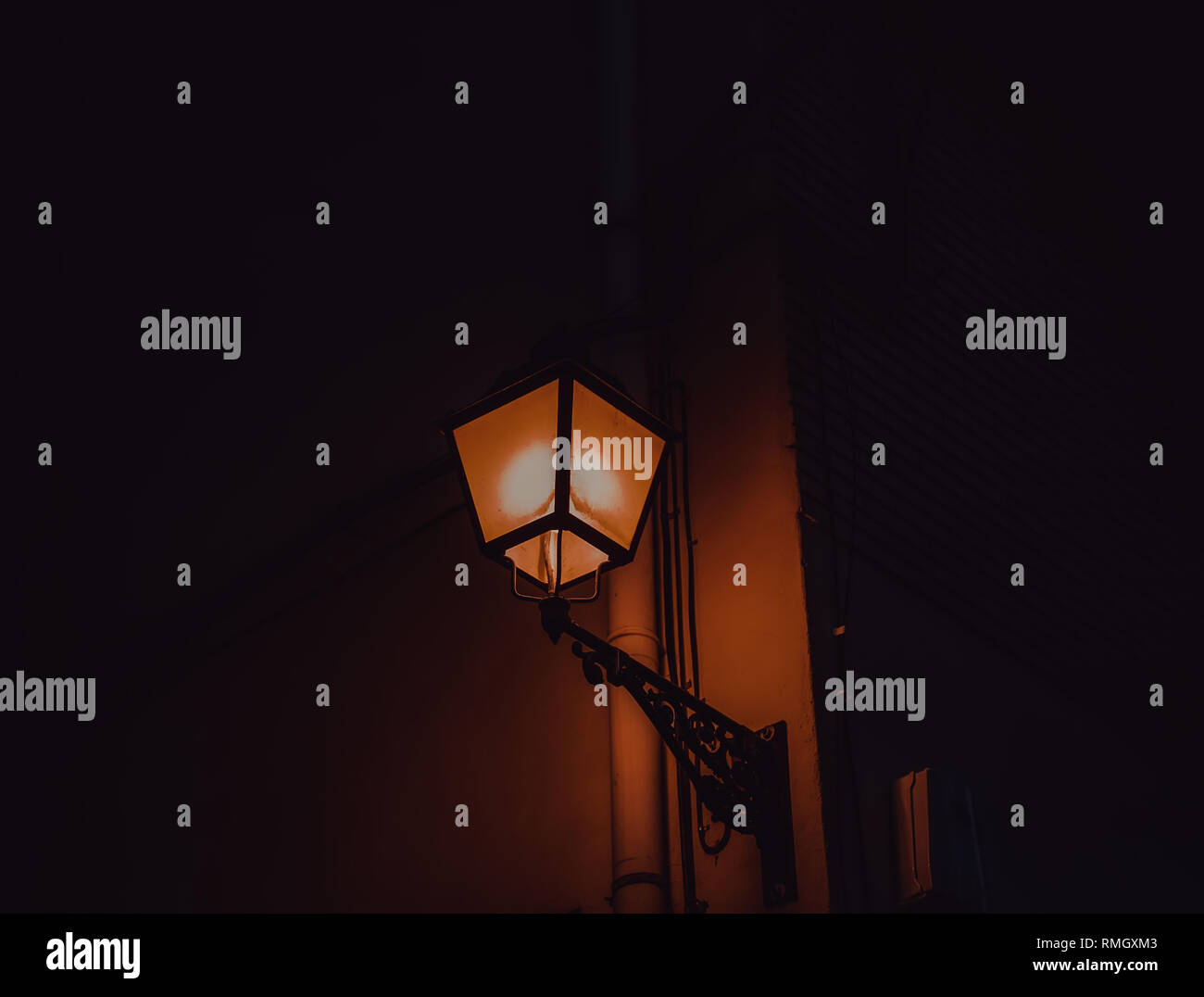 Street lamp lit at night in urban street, technology Stock Photo - Alamy