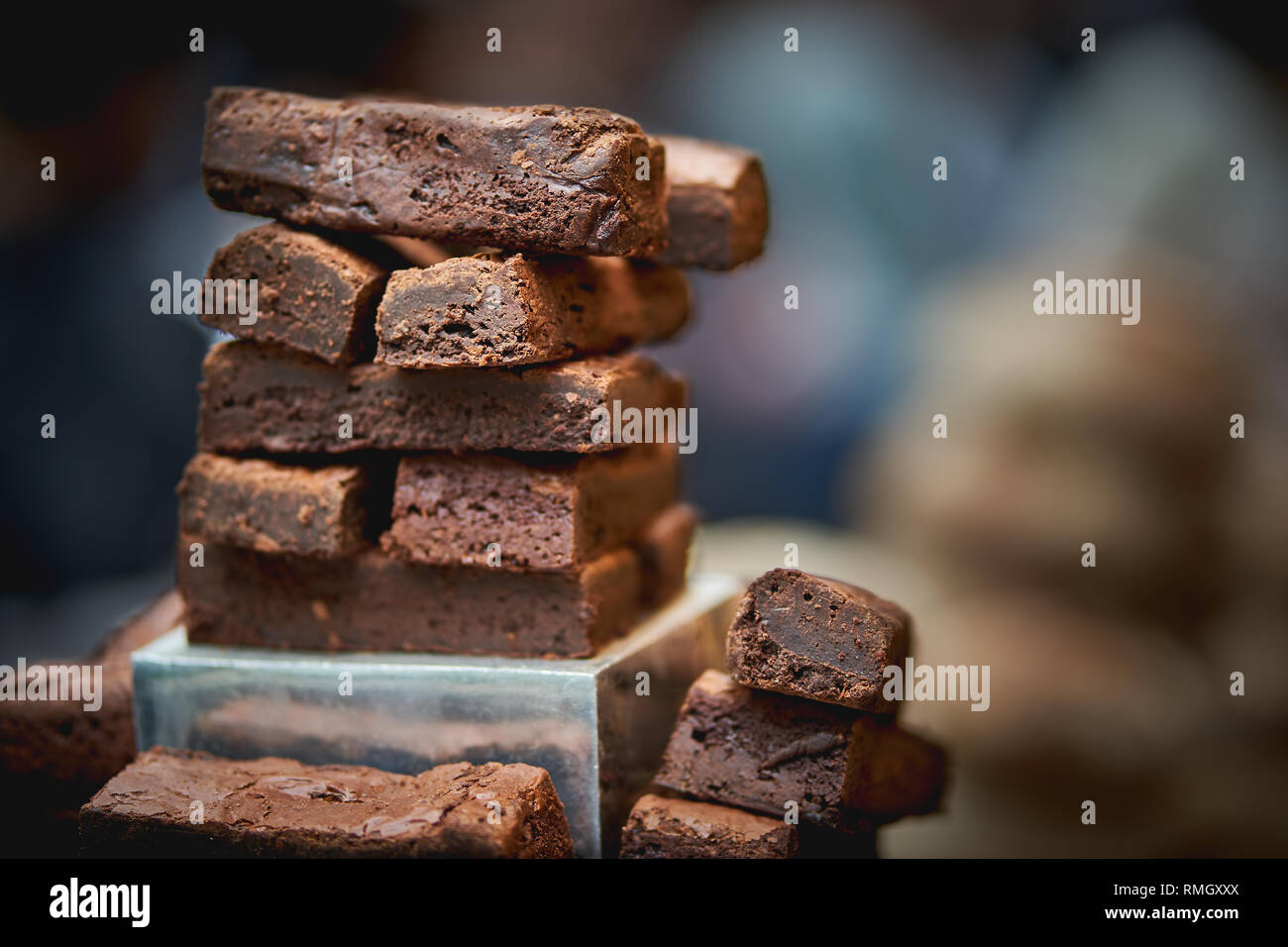 Stack of chocolate brownies with a blurred background on sale in bakery ...