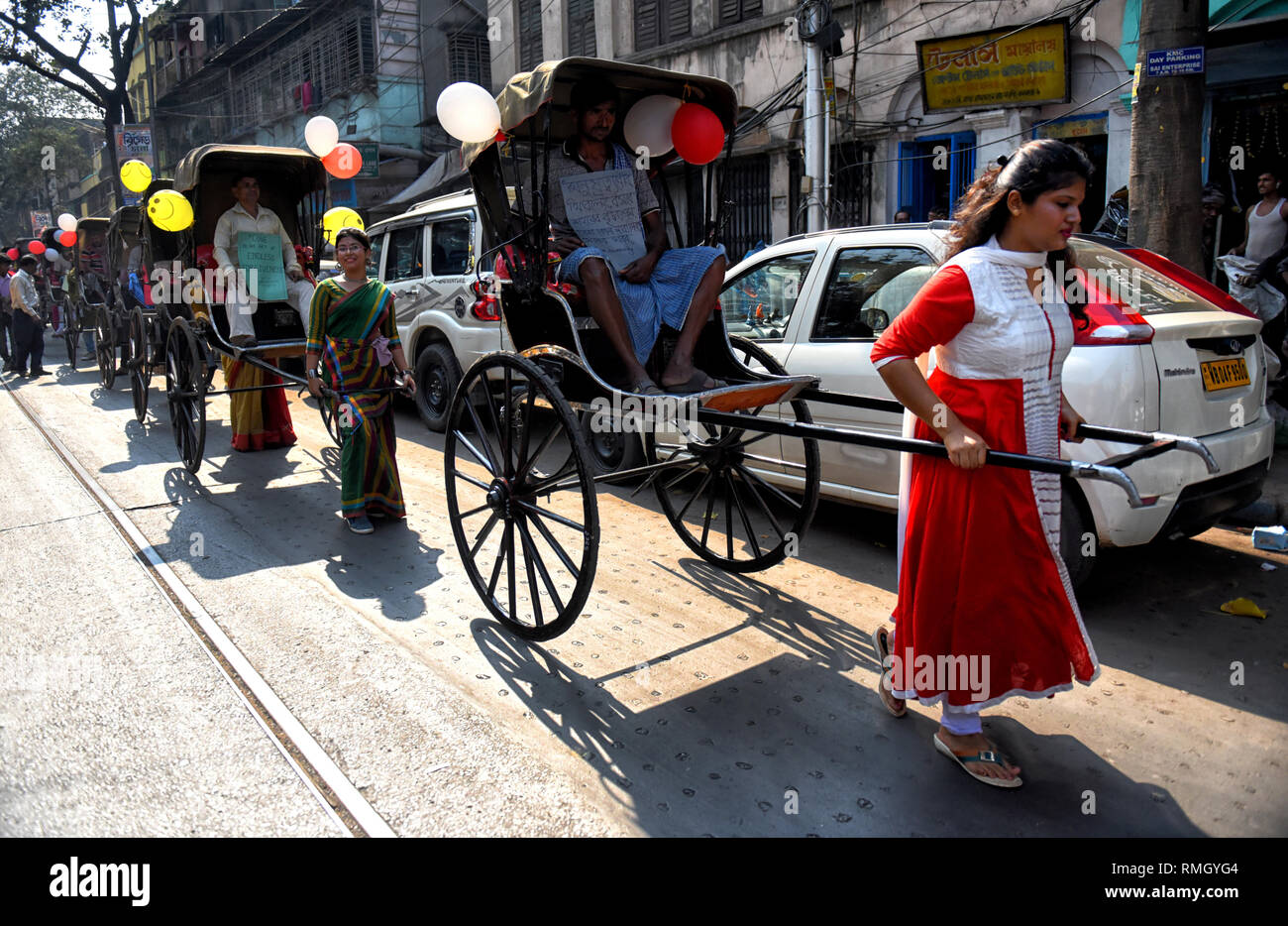 Woman seen pulling the Hand Rickshaw along with their drivers on ...