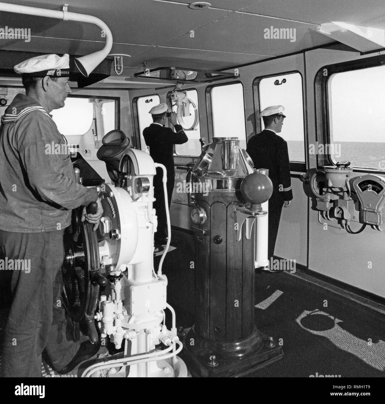 Ship captain and crew Black and White Stock Photos & Images - Alamy