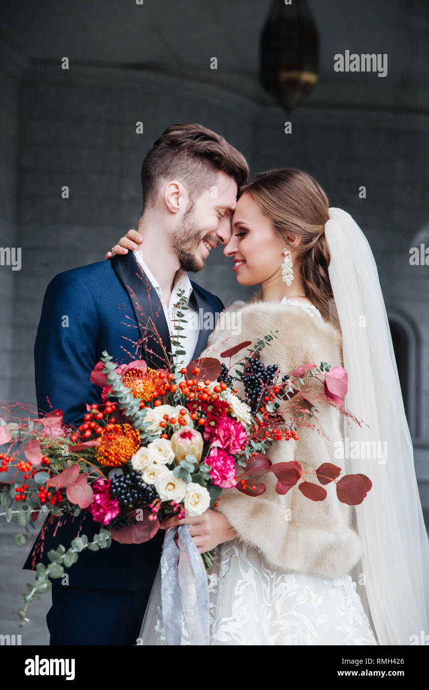 Amazing smiling wedding couple. Pretty bride and stylish groom Stock ...
