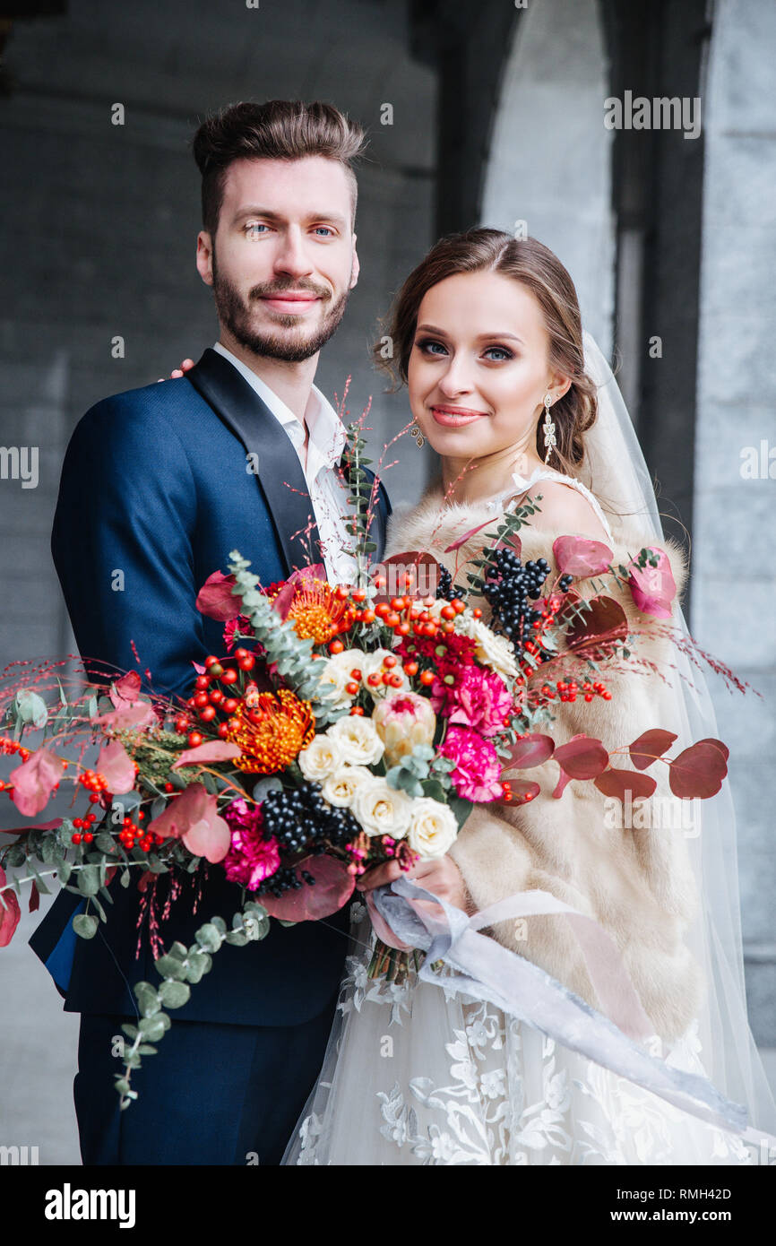 Amazing smiling wedding couple. Pretty bride and stylish groom Stock ...