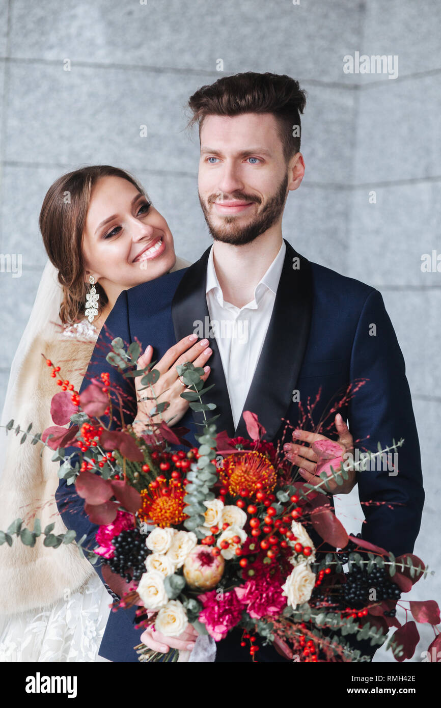 Amazing smiling wedding couple. Pretty bride and stylish groom Stock ...