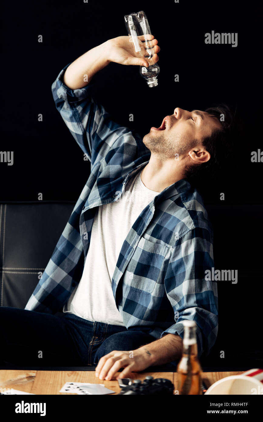man suffering from hangover drinking water at home Stock Photo - Alamy