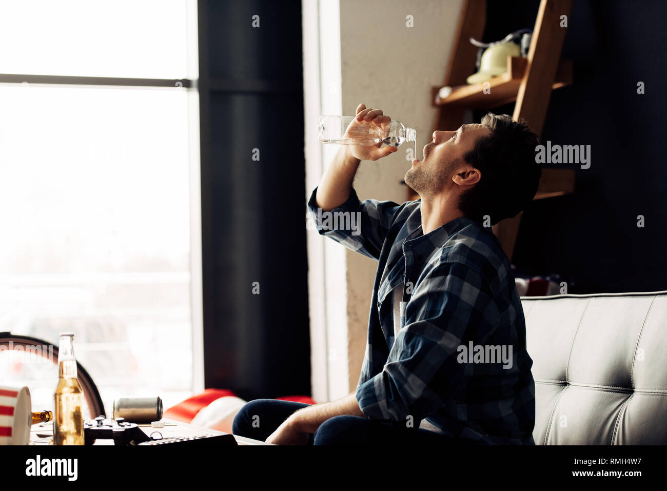 Handsome man drinks drinking water hi-res stock photography and images ...