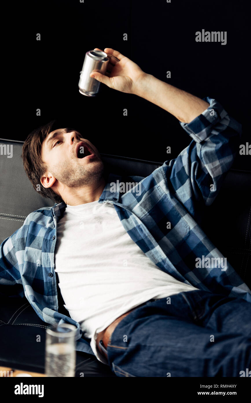 man drinking beer after party in morning Stock Photo - Alamy