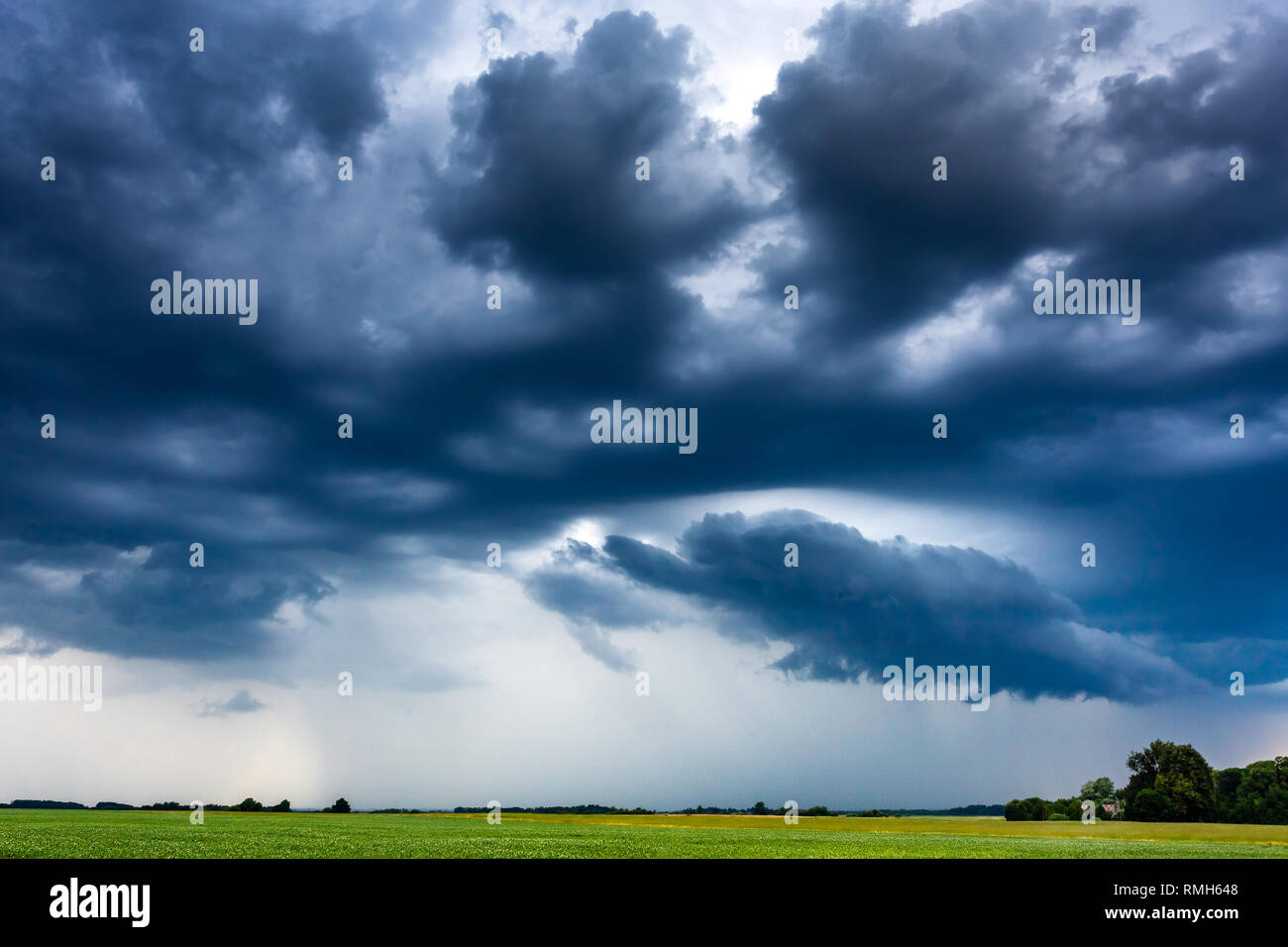 Image of storm clouds at summer Stock Photo - Alamy
