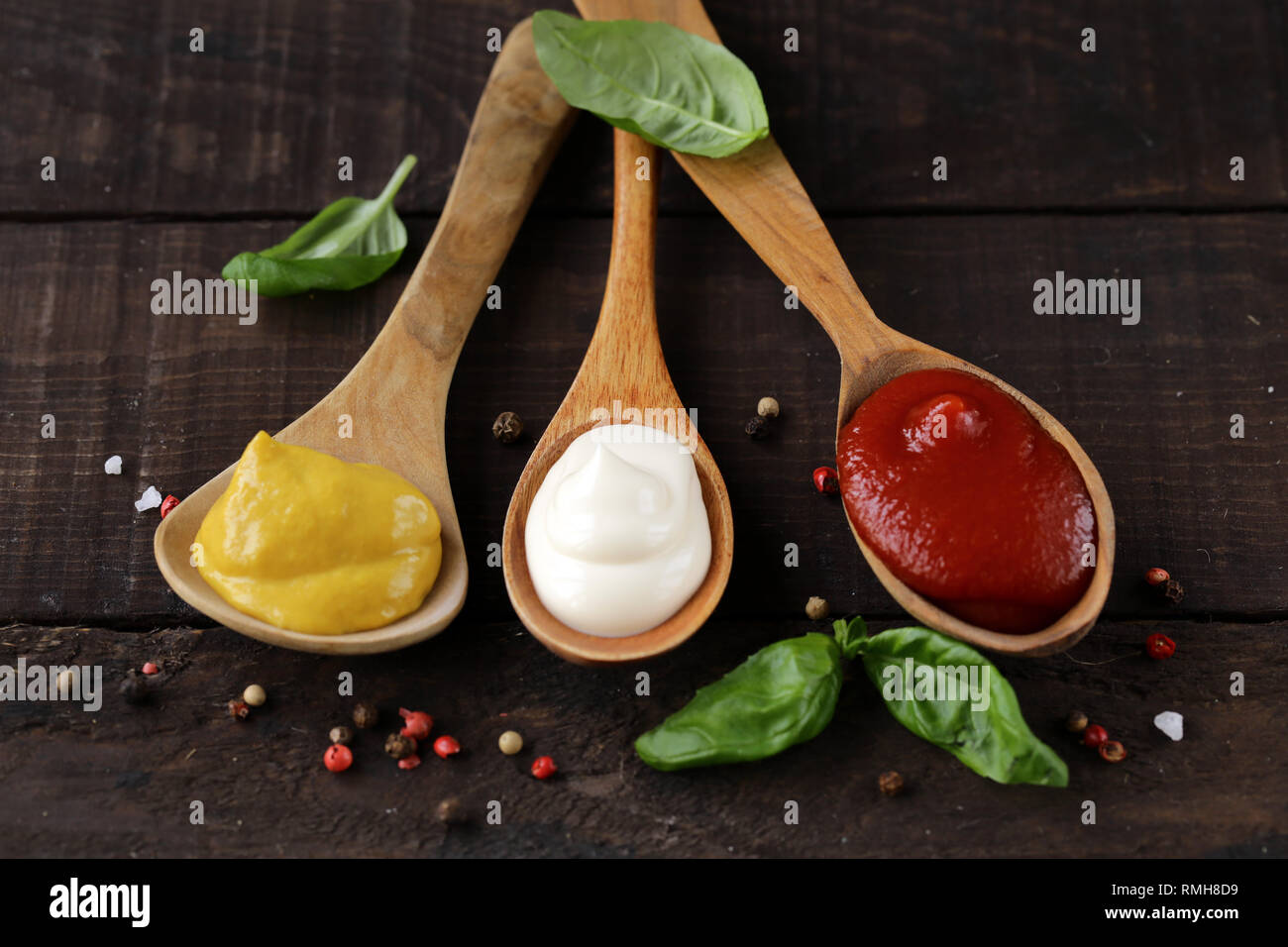 three variants of ketchup, mustard and mayonnaise sauce Stock Photo - Alamy