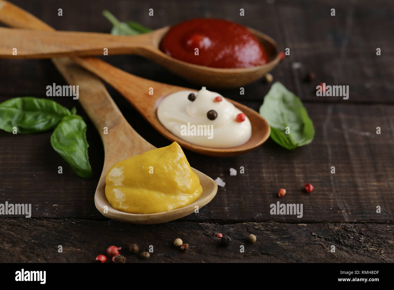 three variants of ketchup, mustard and mayonnaise sauce Stock Photo - Alamy