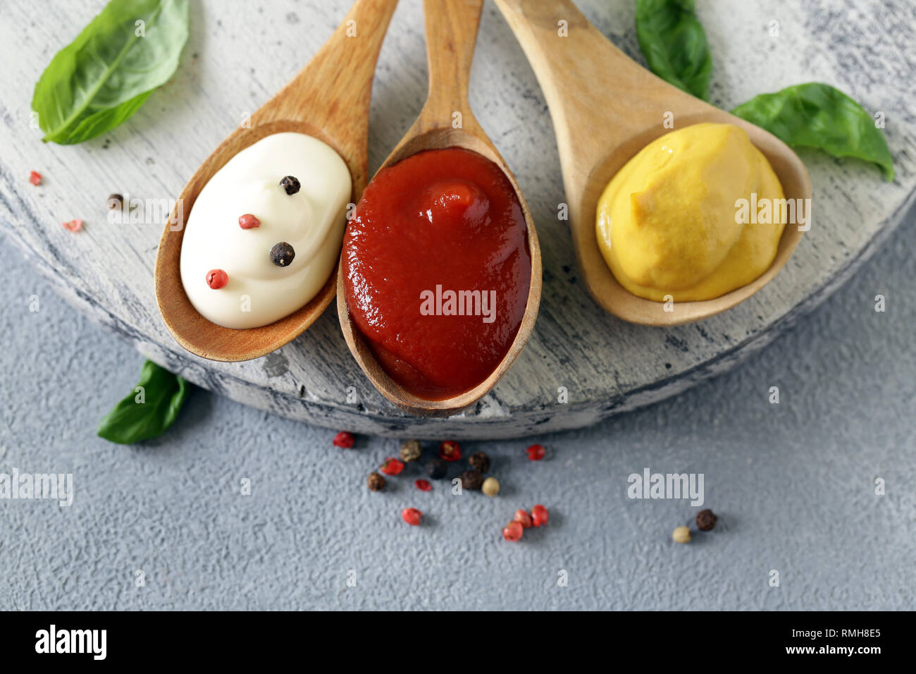 three variants of ketchup, mustard and mayonnaise sauce Stock Photo - Alamy