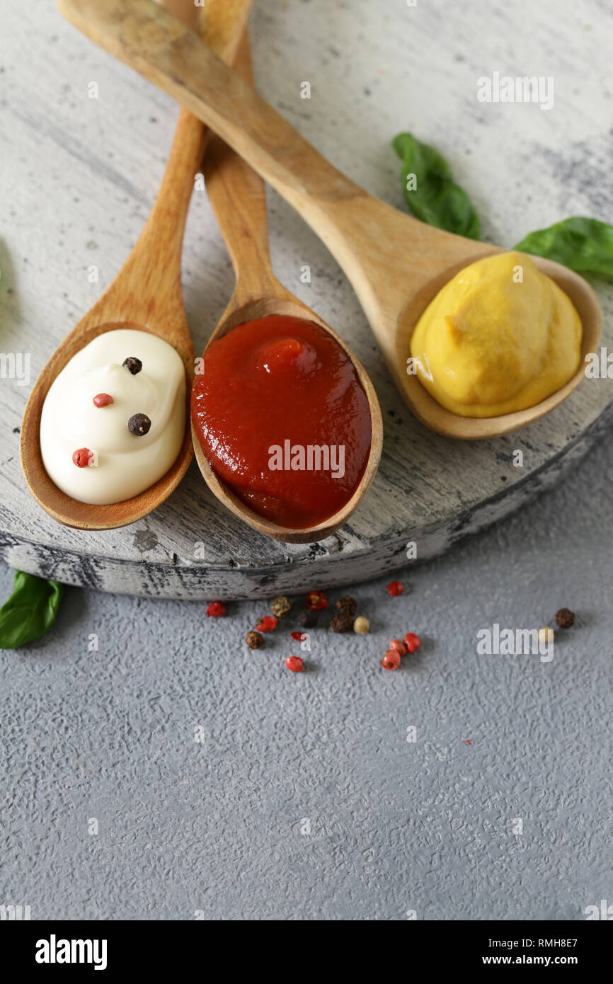 three variants of ketchup, mustard and mayonnaise sauce Stock Photo - Alamy