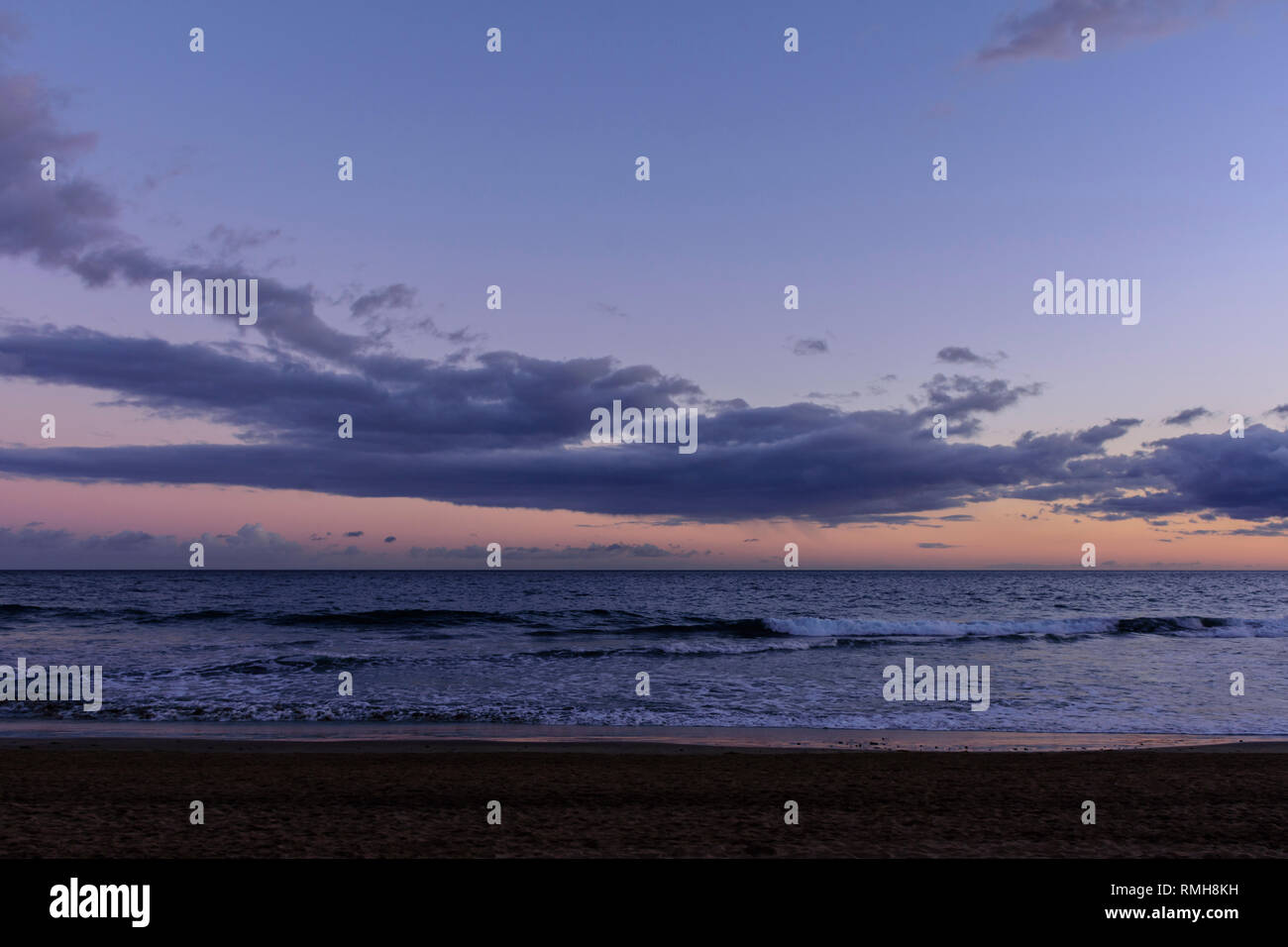 colorful sunset over the atlantic ocean Stock Photo - Alamy