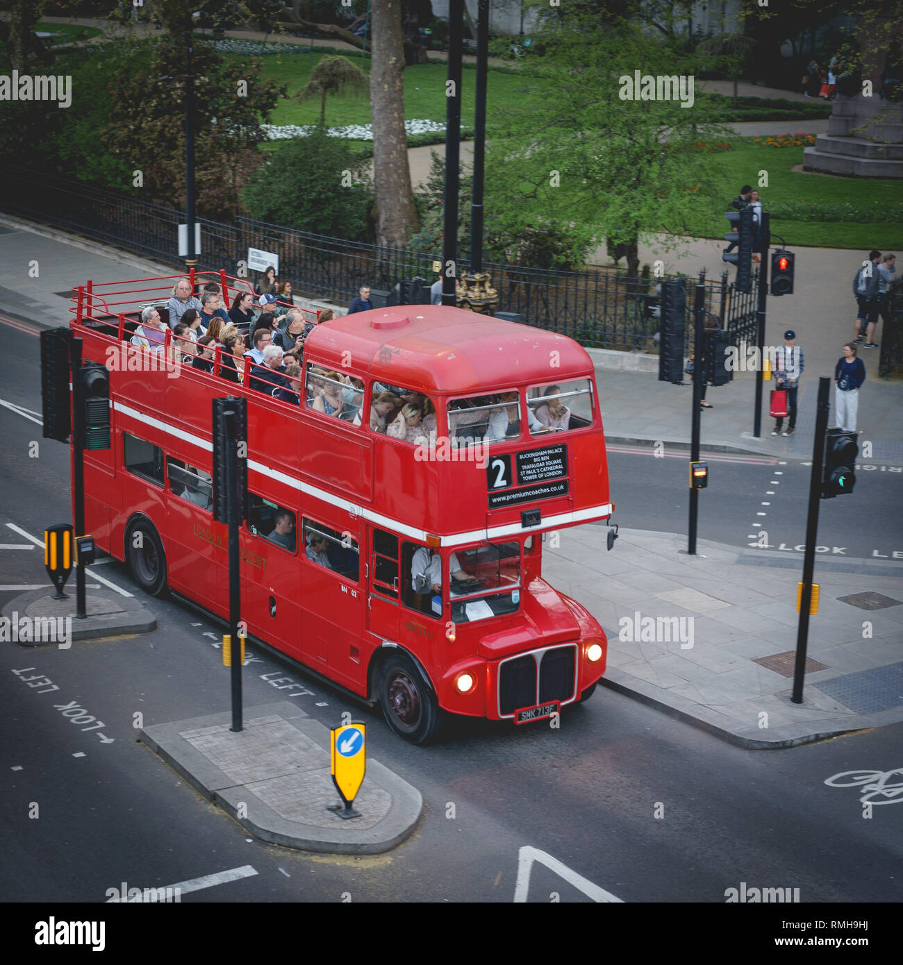 London, UK. April, 2018. A vintage double-decker red bus use for city ...