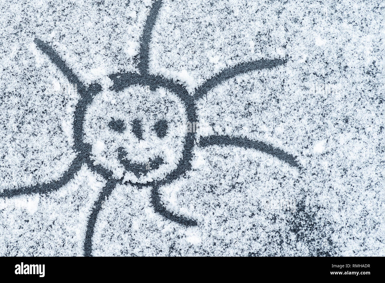 Rozhitsy drawn on snow. Sun drawn in the snow.Soft focus. Background ...