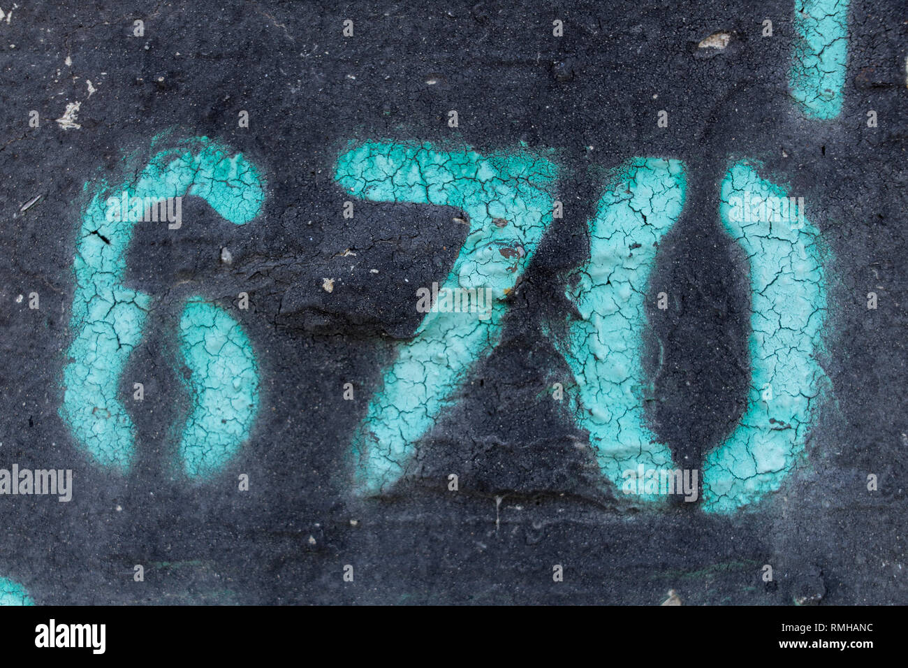stencil number in spray paint, number six hundred and seventy painted ...