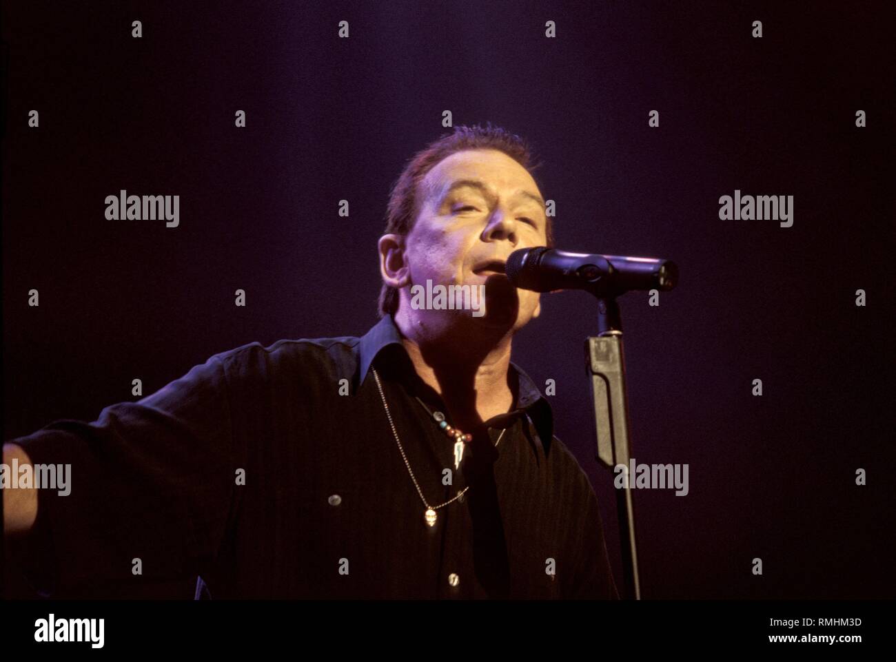 Singer & songwriter Eric Burden is shown performing on stage with the ...