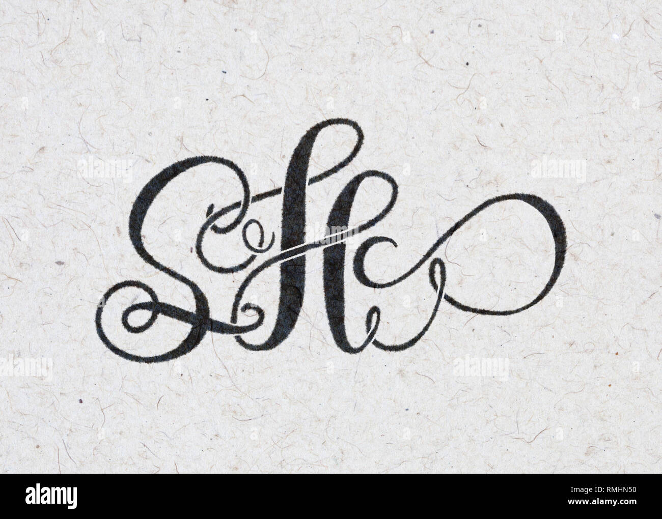 Beautiful letter H with flourishes on kraft paper Stock Photo - Alamy