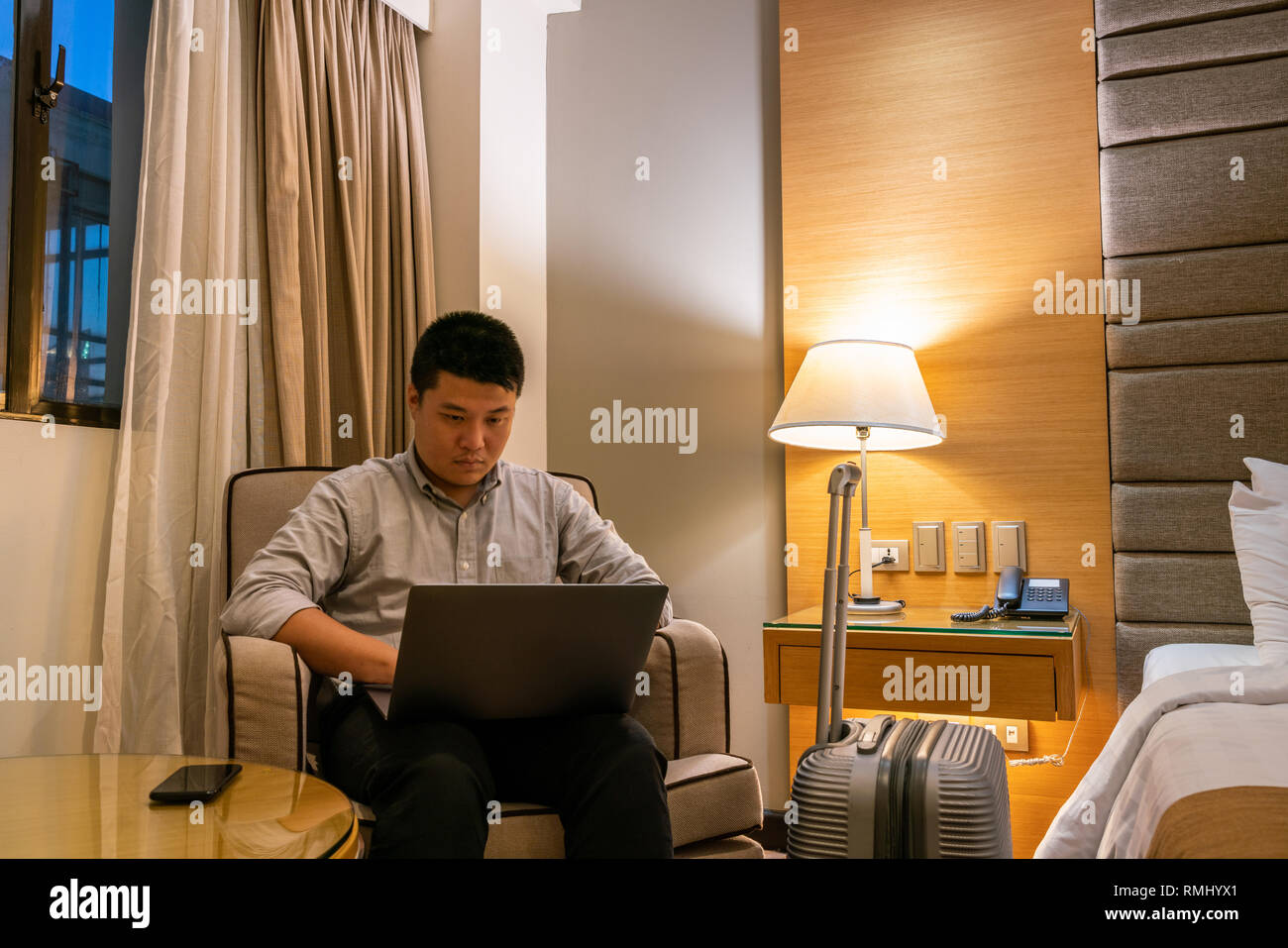 Man hotel room night hi-res stock photography and images - Alamy