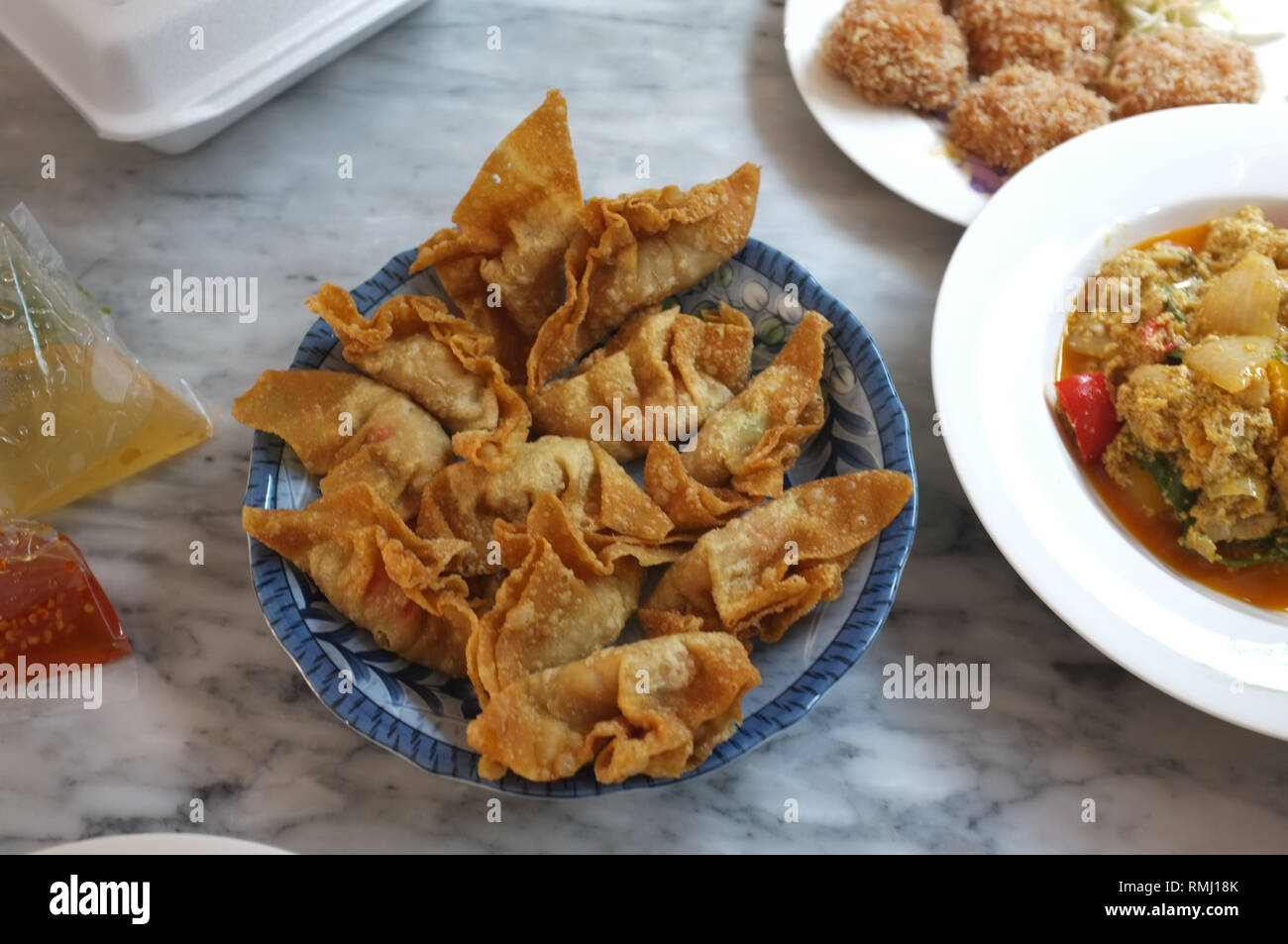 Deep Fried Pork Wonton or (Thai name is Giew Moo Tod) on dish Stock ...