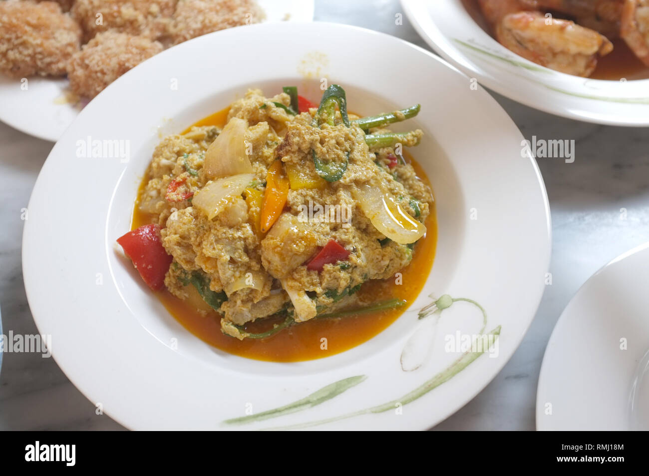 Stir-Fried Sea Crab with Curry Powder Sauce, coconut milk and Eggs or ...