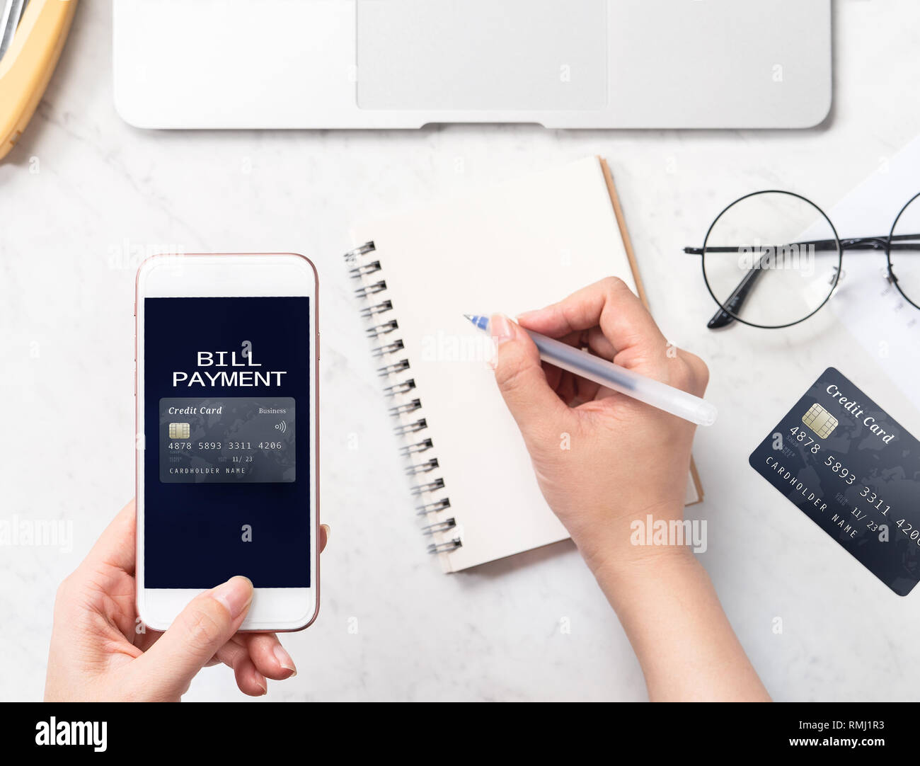 Concept of a woman is doing a online purchase, mock up card and ...