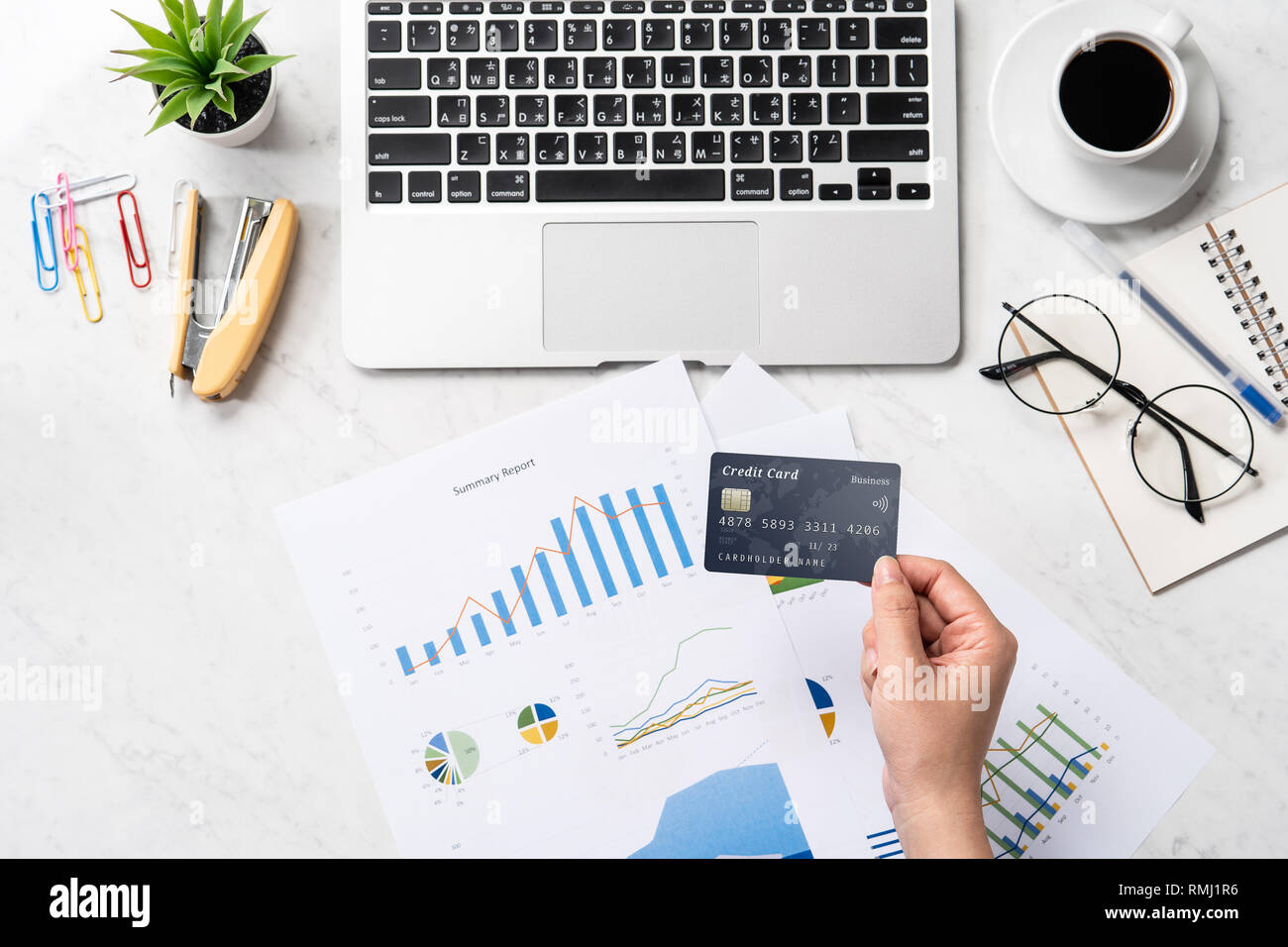 Concept of a woman is doing a online purchase, mock up card and ...