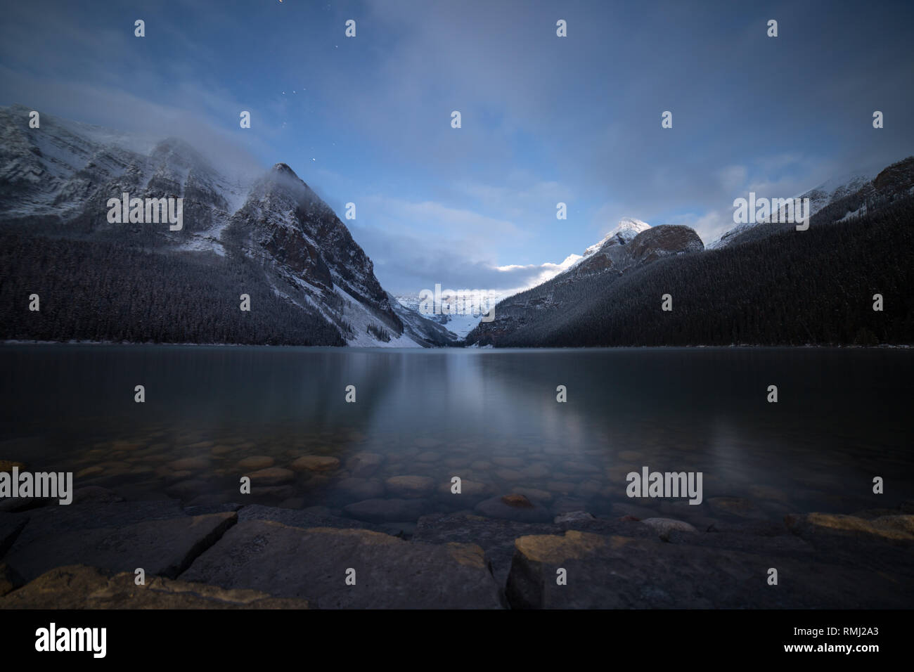 Evening photographs of Lake Louise on a Winter Day, fresh snow covering ...