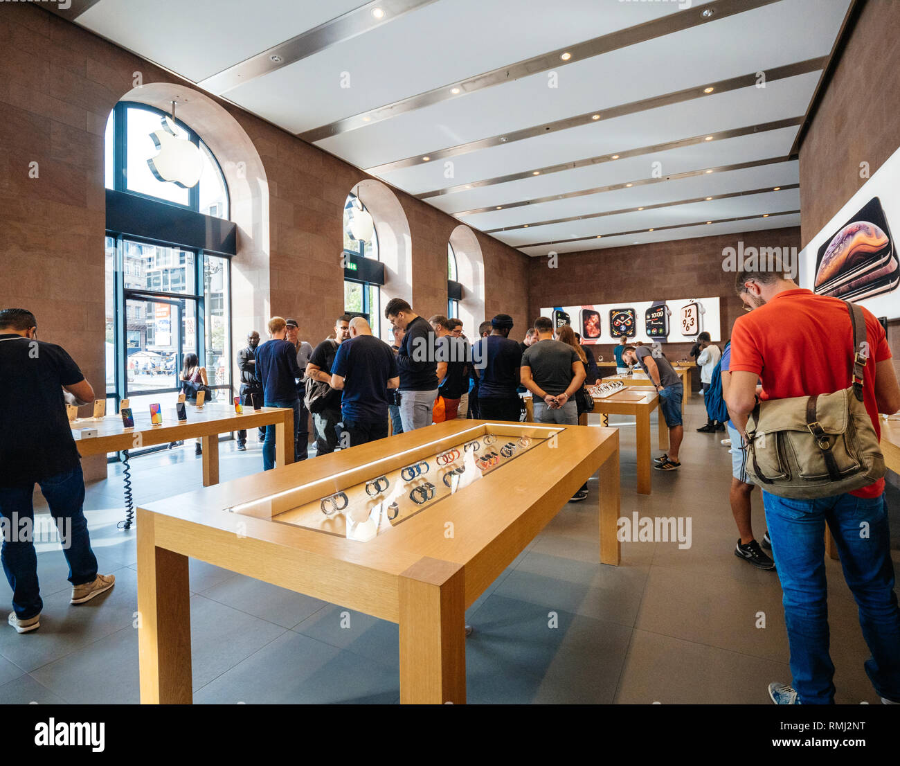 STRASBOURG, FRANCE - SEP 21, 2018: Apple Store with customers people ...