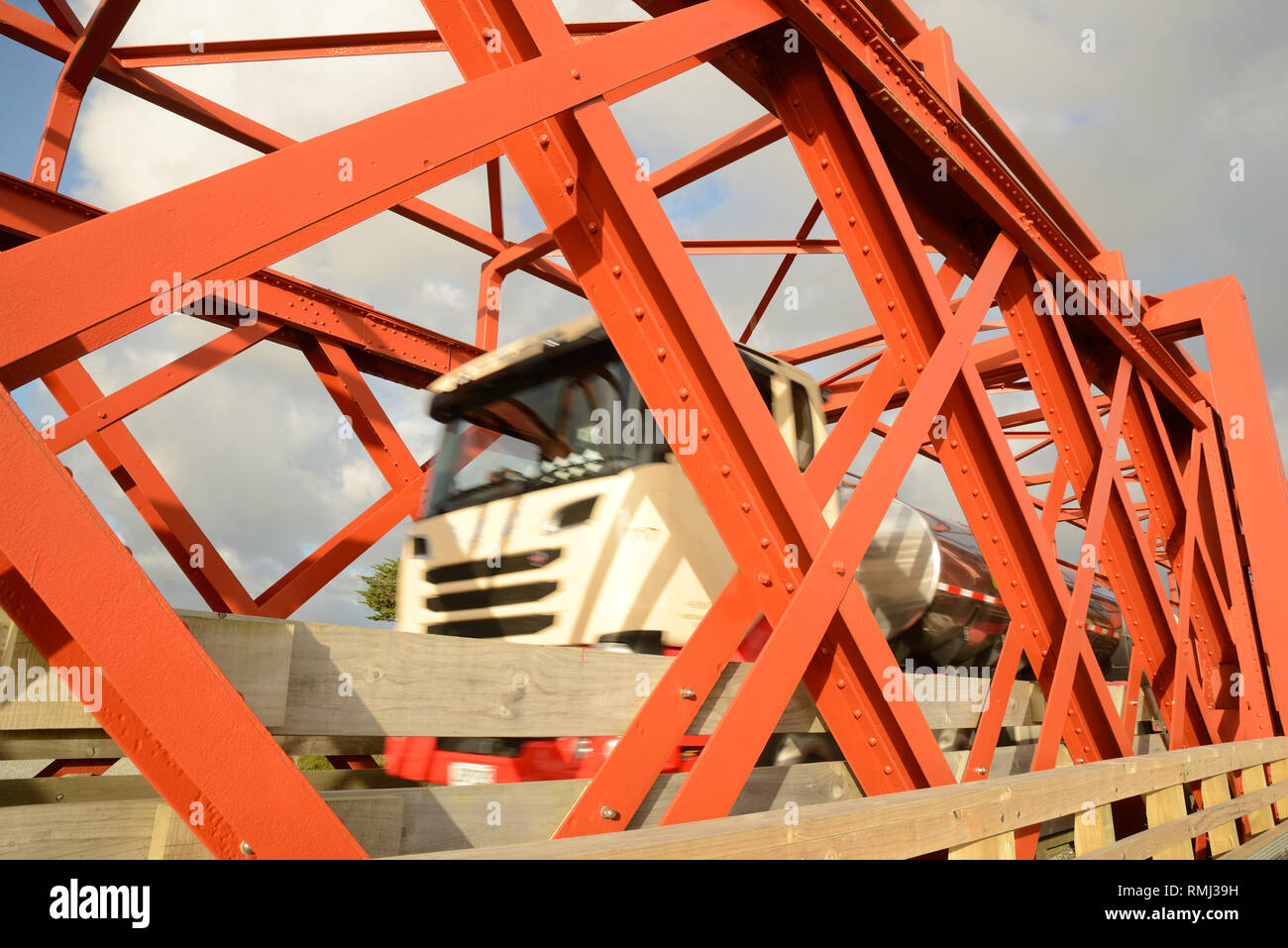 A tanker crosses a single lane truss bridge Stock Photo - Alamy