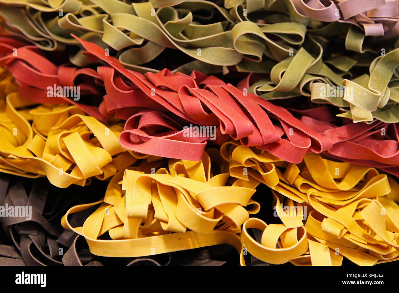 Colourful Italian pasta tagliatelle made from traditional recipe Stock ...