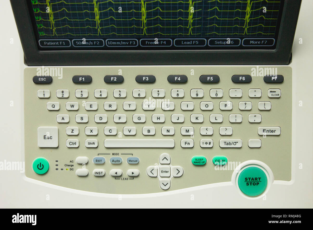 Electrocardiograph medical device with screen and keyboard, top view ...