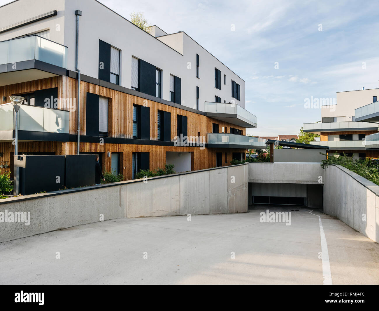 Large garage entrance under the new apartment building complex in ...