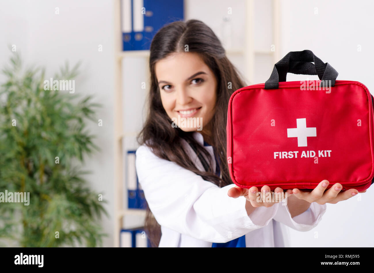 Female doctor in first aid concept Stock Photo - Alamy
