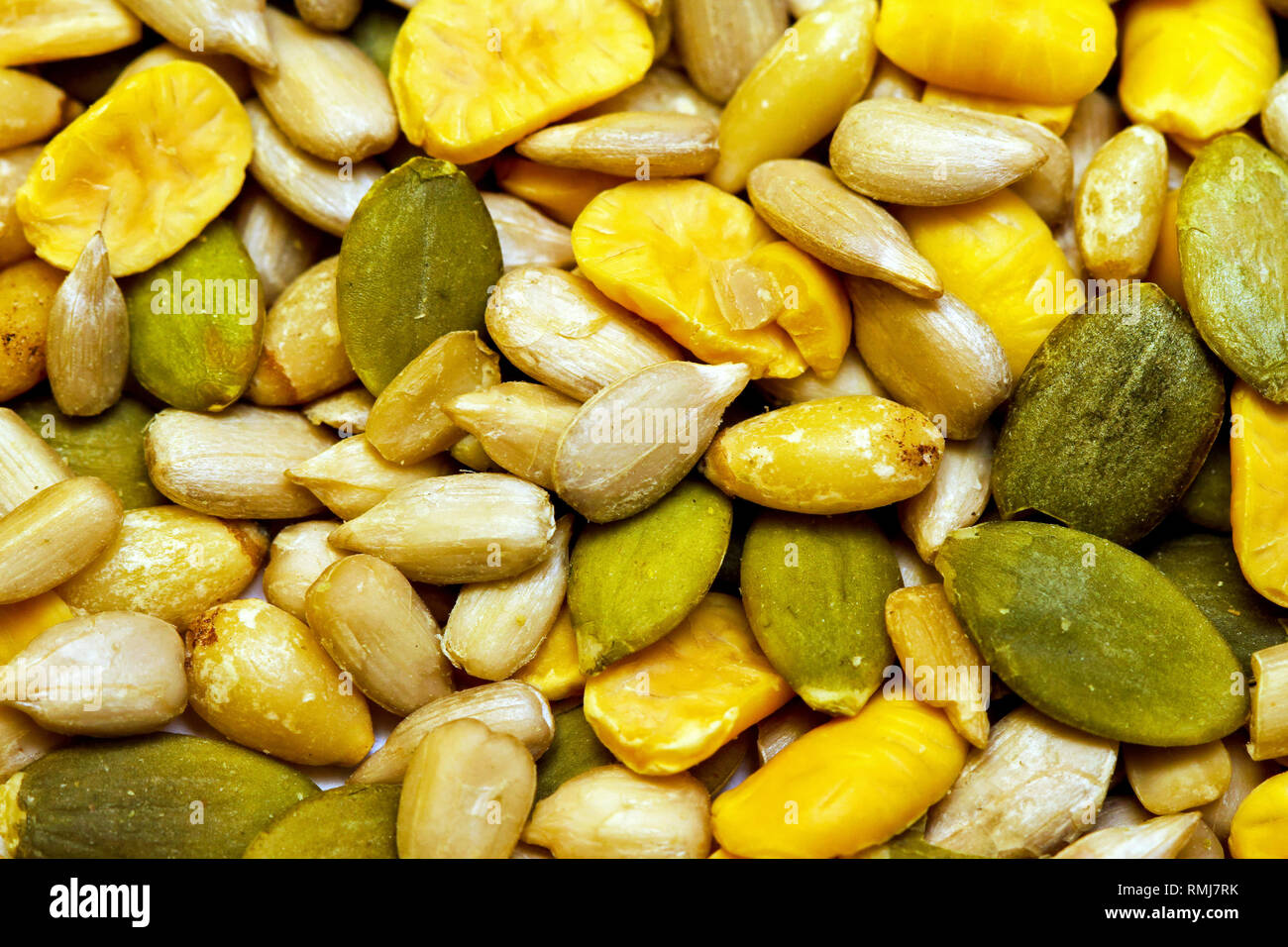 Big pile of healthy dried seeds mix Stock Photo - Alamy