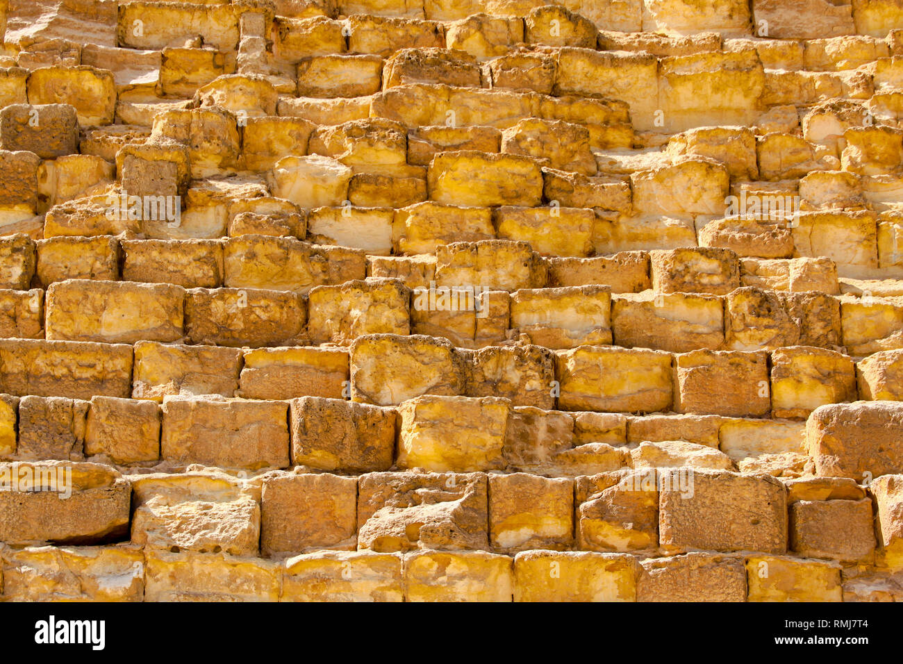 Khufu pyramid in Giza stone block texture Stock Photo - Alamy