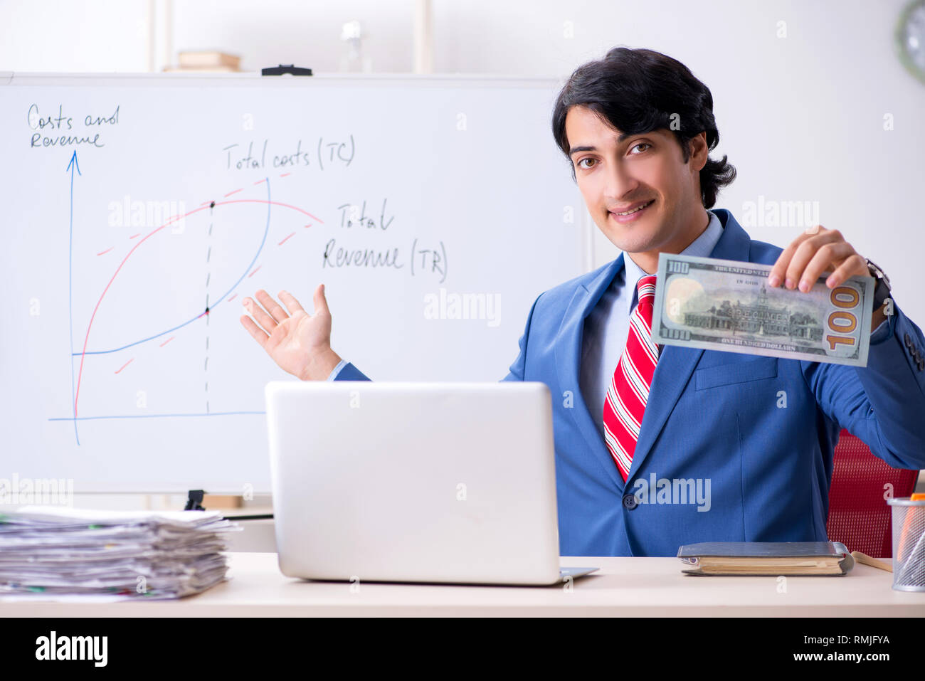 Company employee explaining charts presentation hi-res stock ...