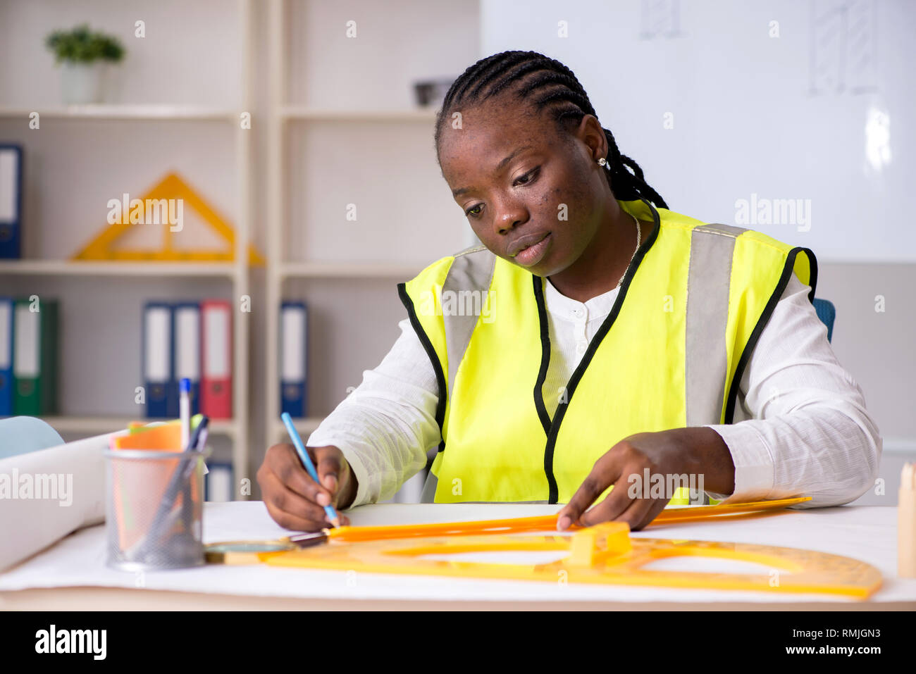 Young black architect working on project Stock Photo - Alamy