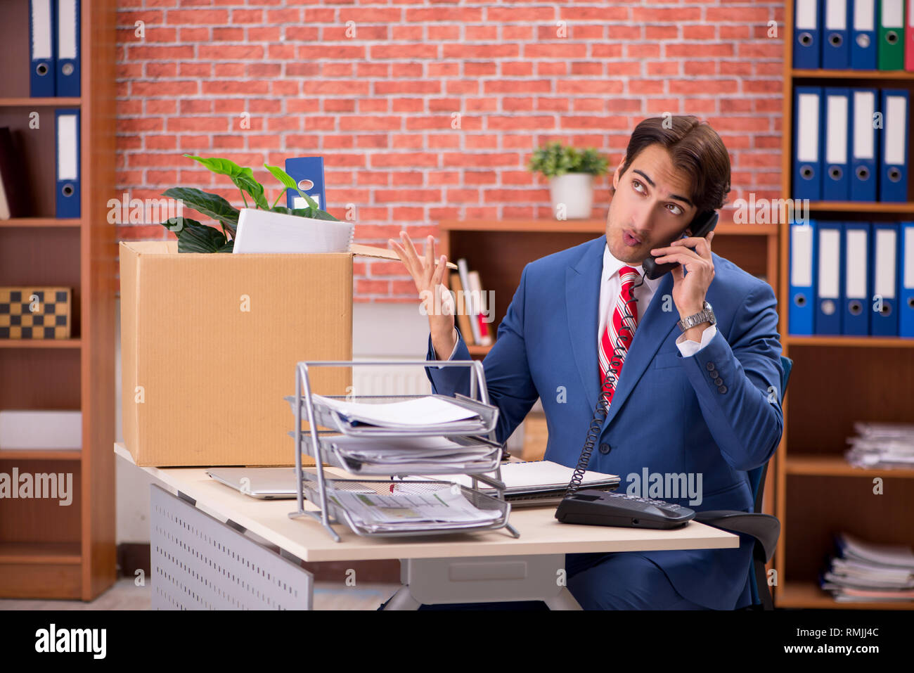 Successful employee getting new job position Stock Photo - Alamy