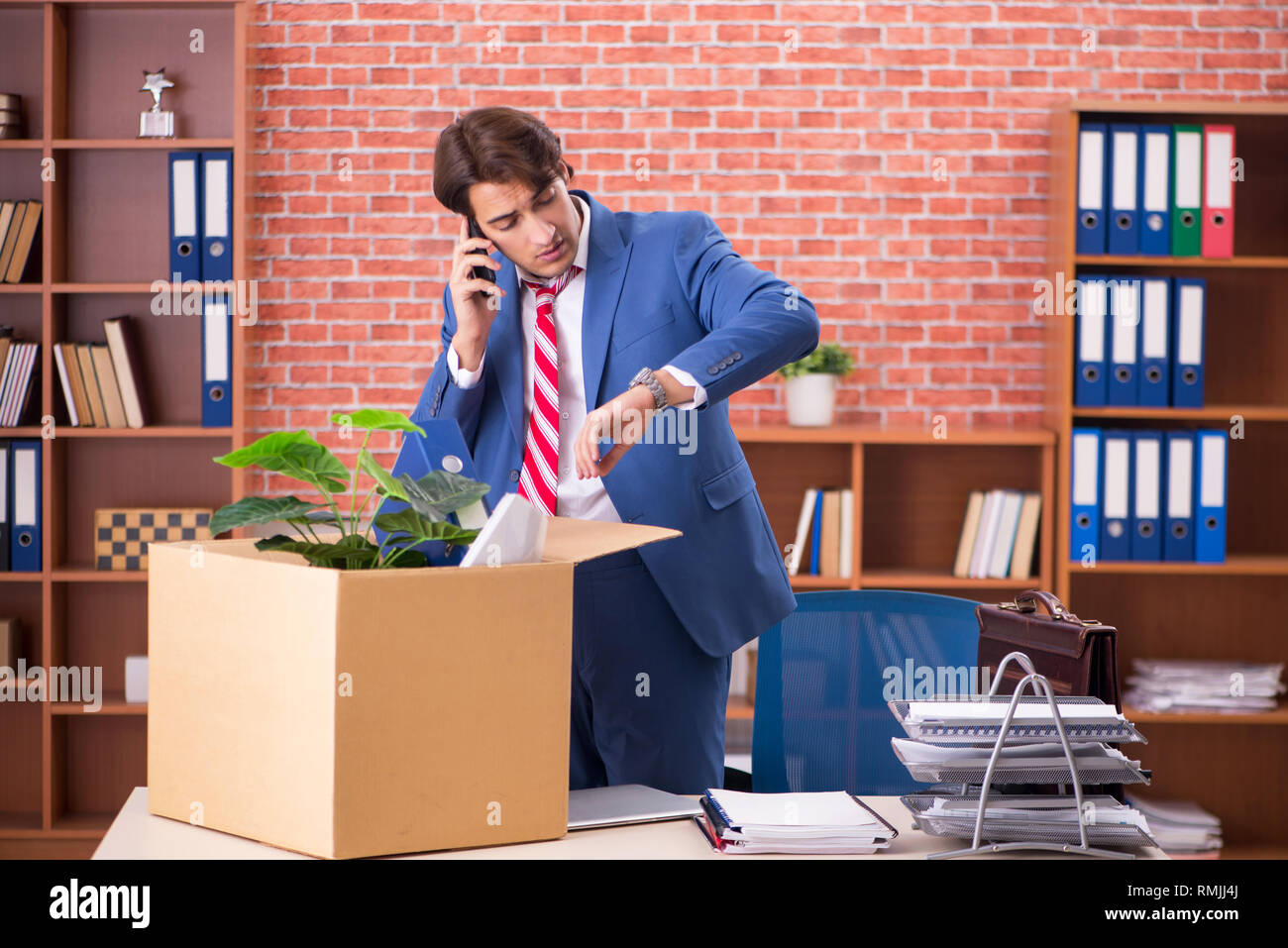 Young person being fired from his work Stock Photo - Alamy