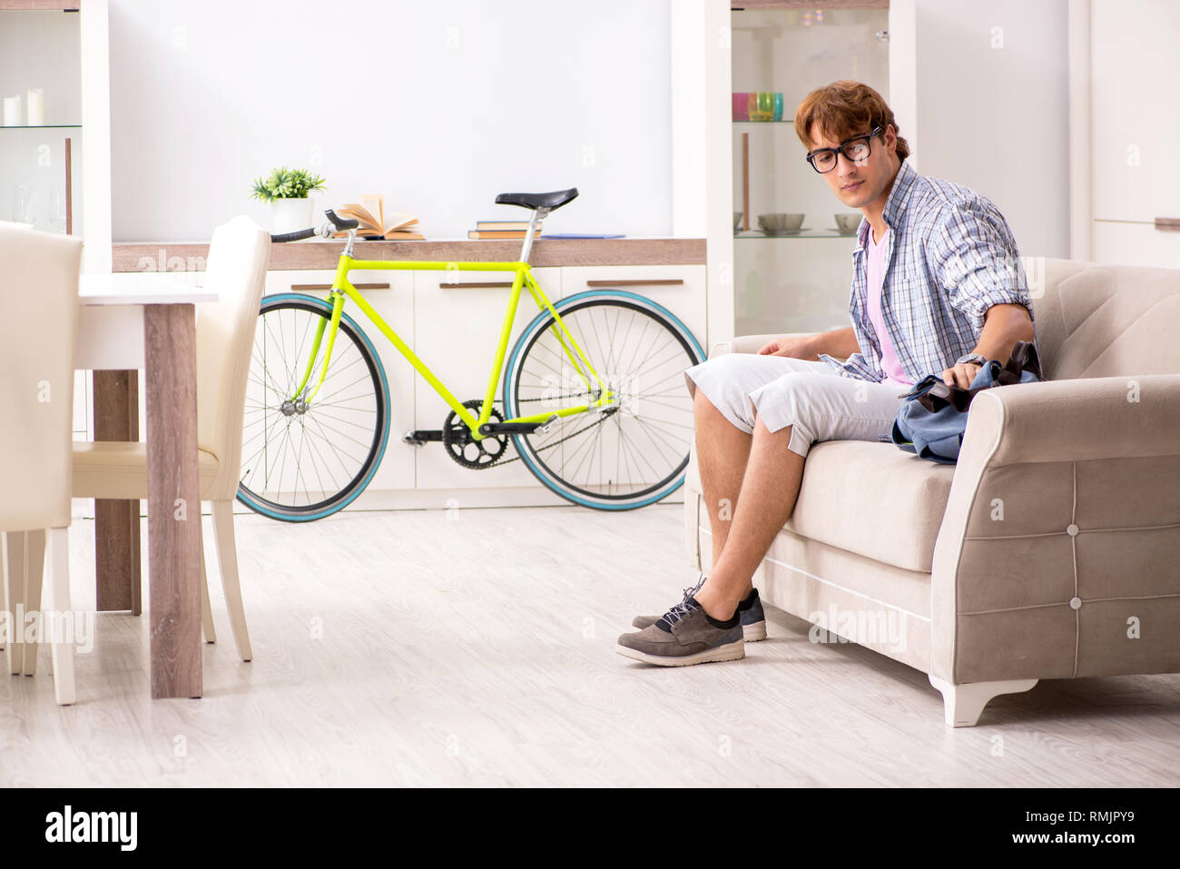 Student commuting to university using cycle Stock Photo - Alamy