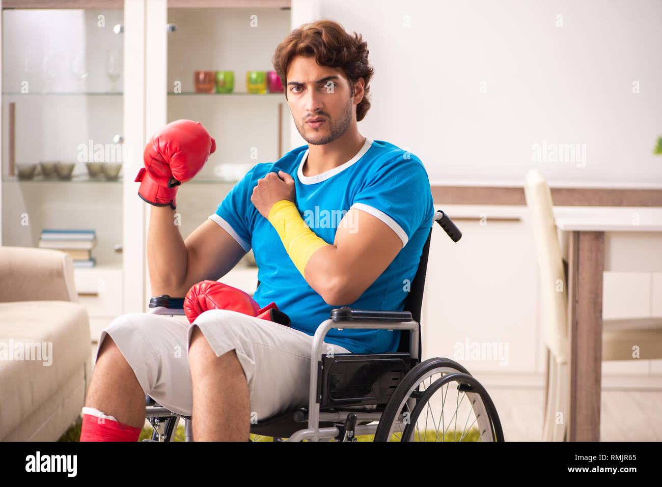 Injured man recovering from his injury Stock Photo - Alamy