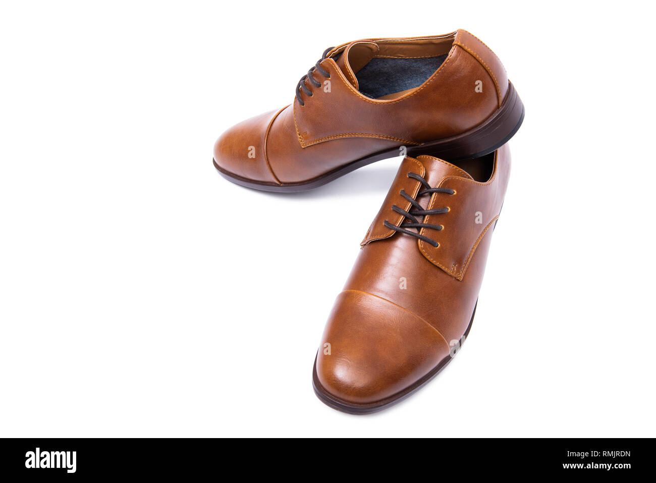 Brown shoes isolated on white background Stock Photo - Alamy