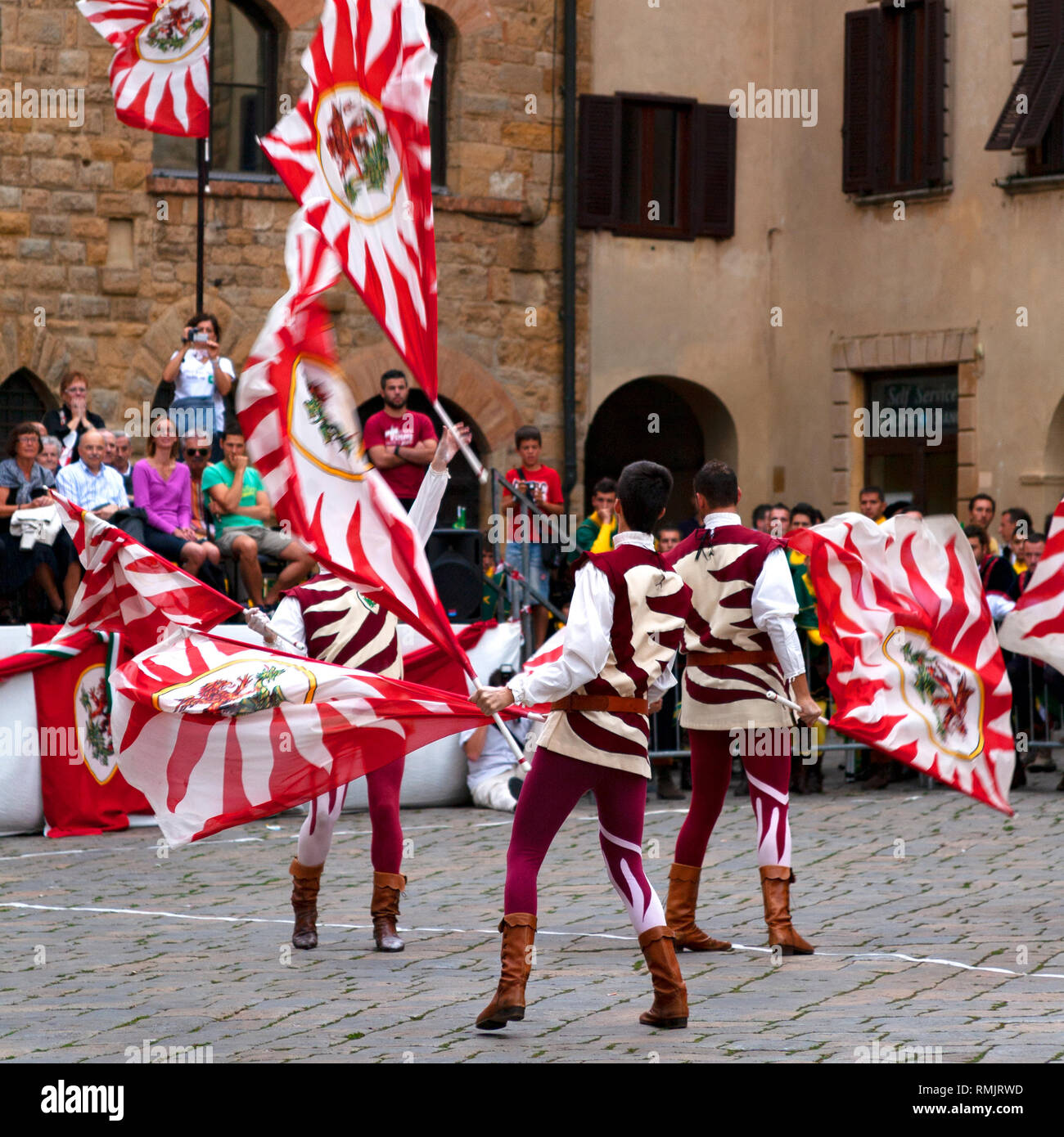 Volterra Italy Europe flag throwing competition. Volterra Hill town ...