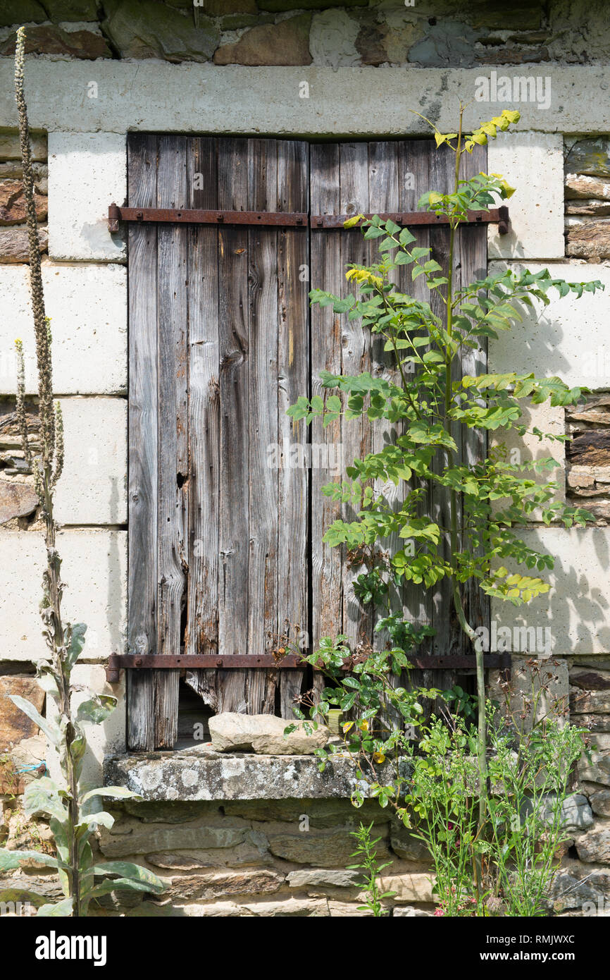 Front of inhabitable house with window and shutters Stock Photo - Alamy