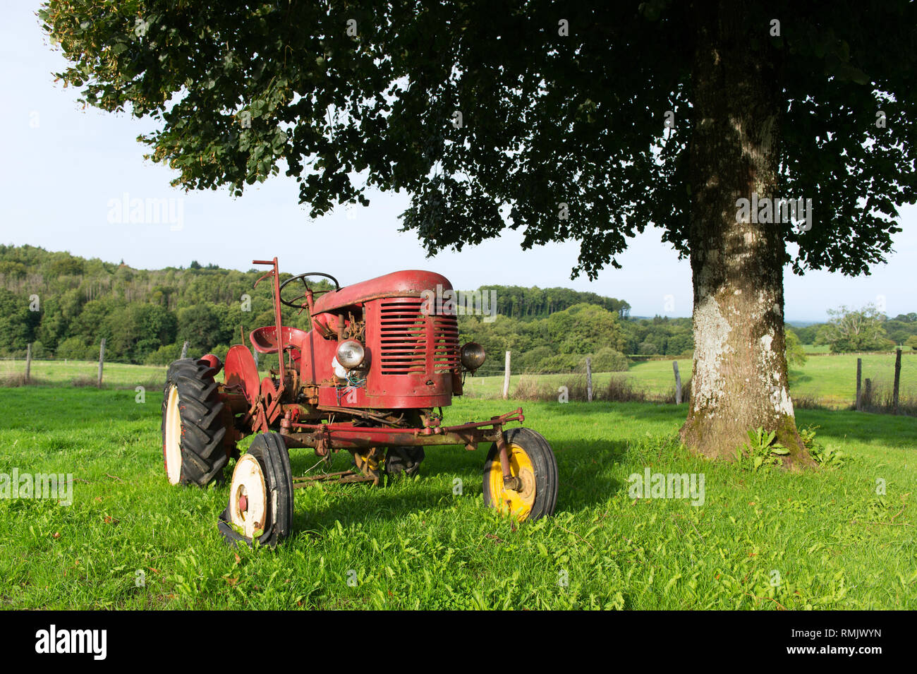 Old red tractor at the farm Stock Photo - Alamy