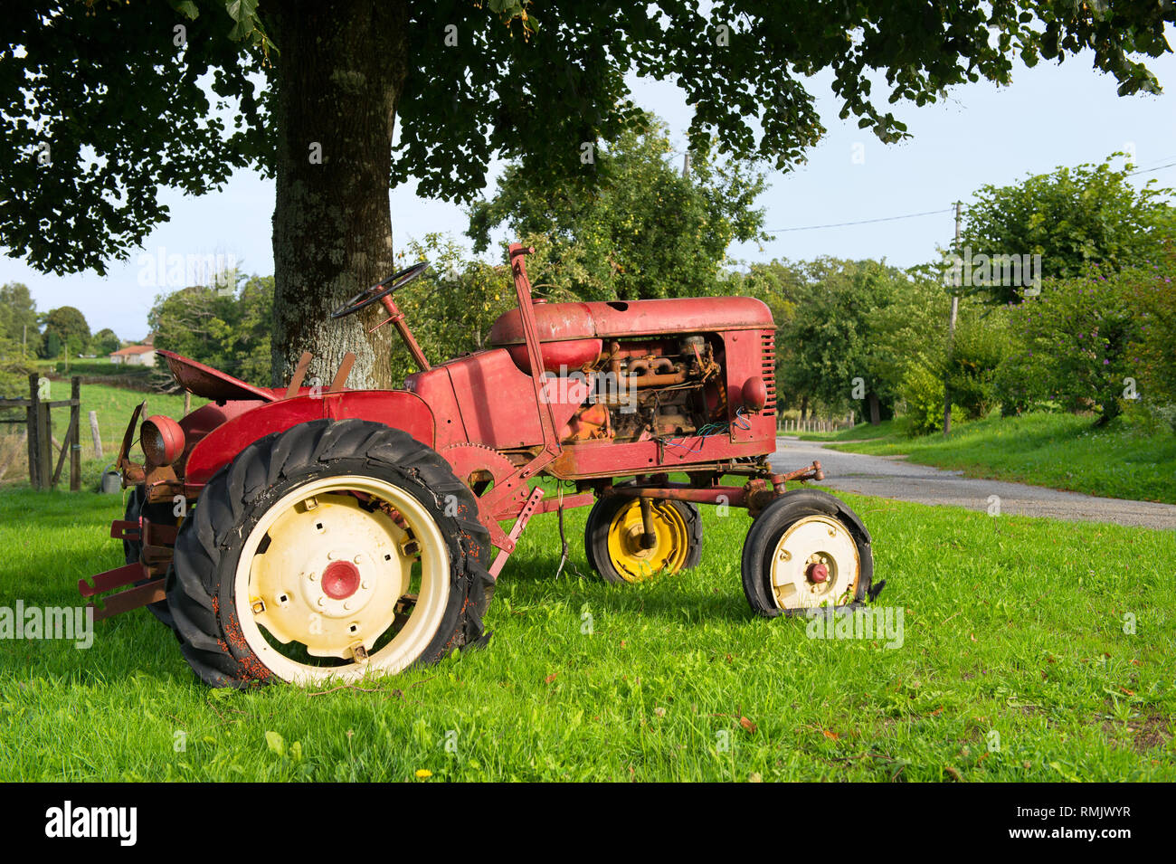 Old red tractor at the farm Stock Photo - Alamy