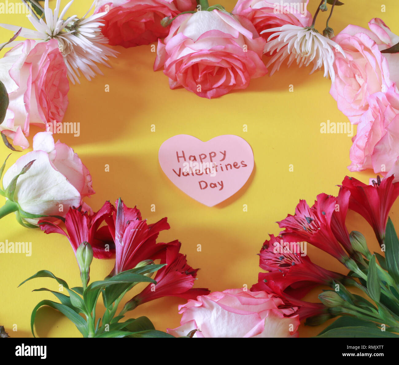 Flower arrangement with cute writing on a heart Stock Photo - Alamy