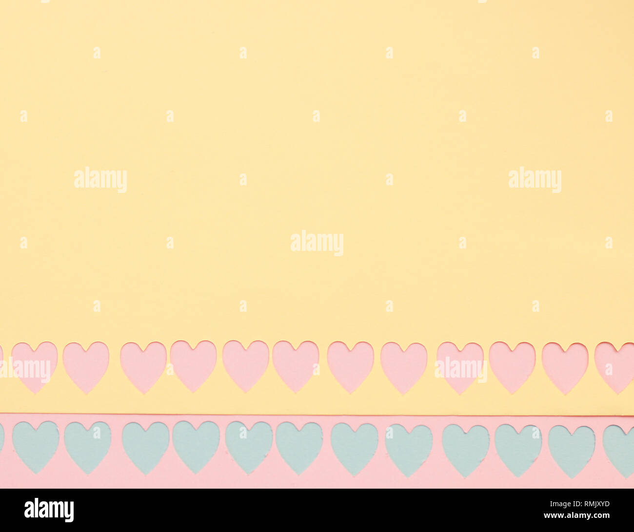 Colorful background with cutout hearts Stock Photo - Alamy